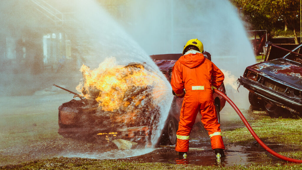 Firefighters fighting a fire operation, Water spray by high pressure ...